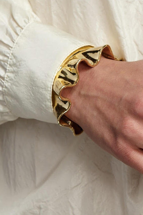 Raven Kauffman Reclaimed Brass Ruffle Sleeve Cuff – Des Kohan